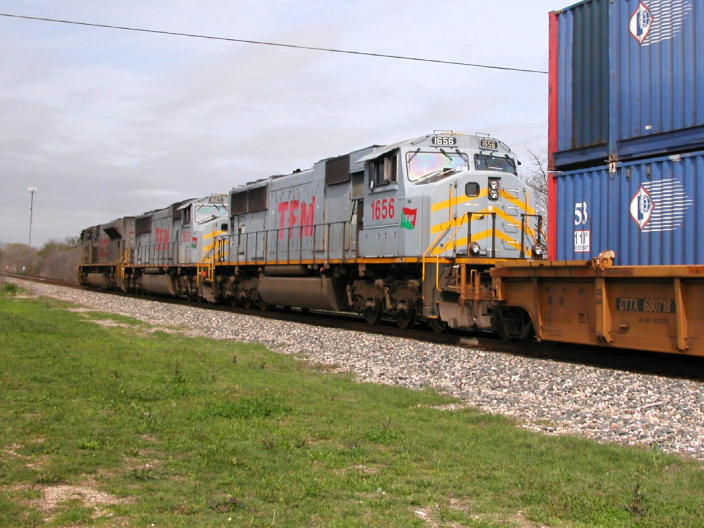TFM 1656, TFM 1603 29Feb2012 NB behind KCS 4006 N of Center Street